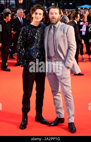 Timothee Chalamet, left and Joel Edgerton pose for photographers at the ...