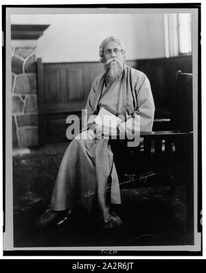 Rabindranath Tagore, full-length portrait, seated, facing front. Circa ...