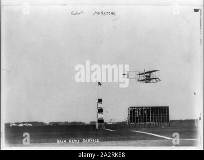 Ralph Johnstone, an early 20th-century aviator, is captured in a ...