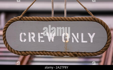Crew Only sign Stock Photo - Alamy