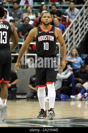 Houston Rockets guard Eric Gordon, right, pulls in a rebound as Denver ...