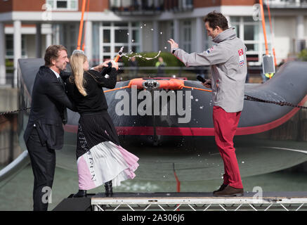 Sir Jim Ratcliffe (left), his daughter Julia and Sir Ben Ainslie (right) officially name the ...