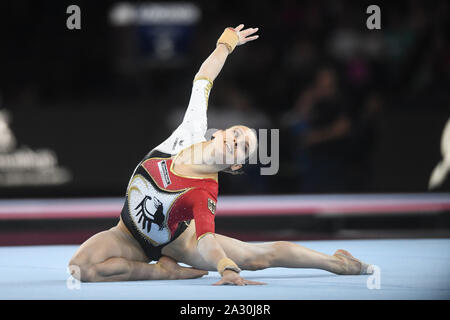 Sarah Voss, of Germany, performs her floor exercise routine during the ...