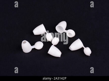 Plastic rivets for clothing. Sewing accessories on black background ...