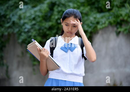 Minority Female Student Under Stress With School Books Standing Stock ...