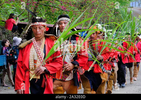 Red-robed Tsou men parade at the Tsou Mayasvi festival in the village ...