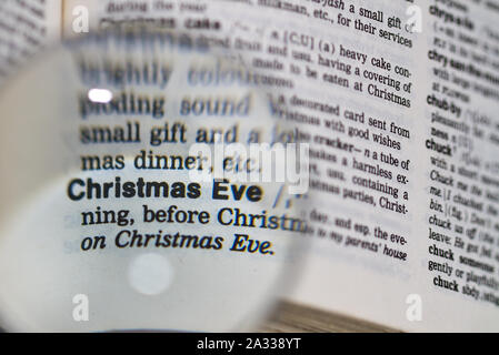 the word Christmas Eve definition in old dictionary under magnifying ...