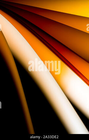 bright orange colored illuminated notepad in various position and ...
