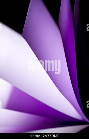 bright purple colored illuminated notepad in various position and ...