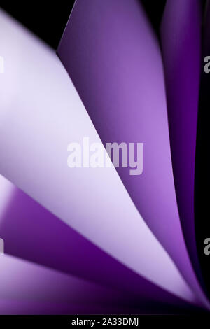 bright purple colored illuminated notepad in various position and ...
