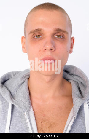Face of young bald rebellious man looking at camera Stock Photo - Alamy