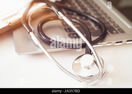 Tablet pc and medical tools Stock Photo - Alamy