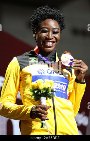 Rushell Clayton, of Jamaica, poses with her medal after taking bronze ...