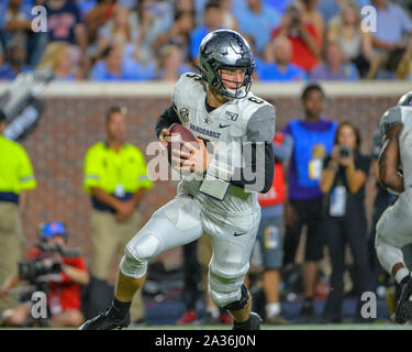 Vanderbilt quarterback Riley Neal (6) scrambles away from Georgia ...