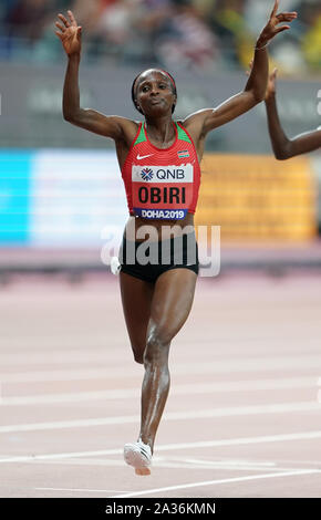 Hellen Obiri of Kenya celebrates after winning the gold medal in the ...
