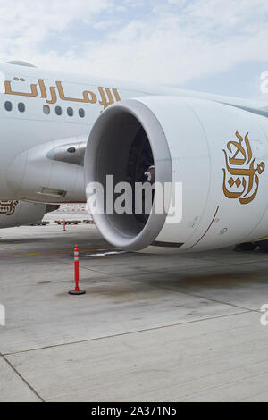 The Emirates Airlines logo on the engine of a model of the Airbus A380 ...