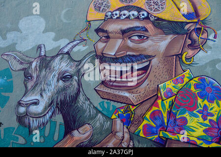 Graffiti street art portrait of a Native American Indian chief, in the ...