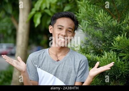 A Confused Young Filipino Teenage Male Stock Photo - Alamy
