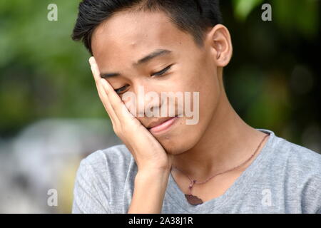 Young Filipino Male And Sadness Stock Photo - Alamy