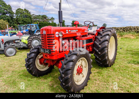 Vintage red tractor. Mc Cormick Farmall Cub. Servoz. France Stock Photo ...