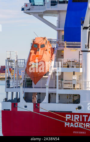 Emergency freefall lifeboat on the rear of a petrol tanker. The ...