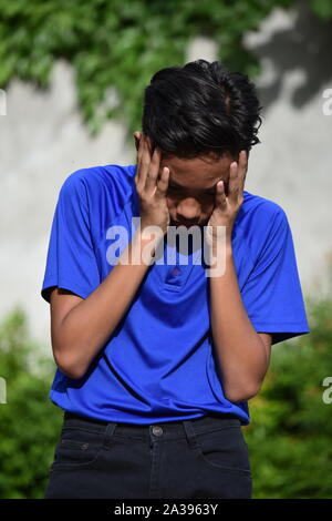 Depressed Handsome Filipino Person Stock Photo - Alamy