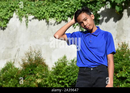 A Confused Young Filipino Teenage Male Stock Photo - Alamy