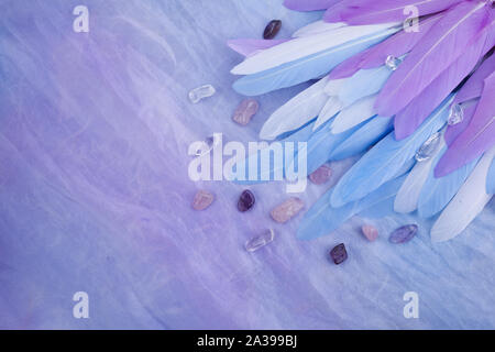 Angel Healing. Feather in the right corner on multi colored background ...