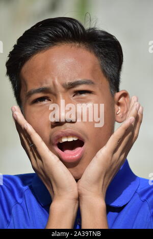 Startled Young Filipino Male Stock Photo - Alamy