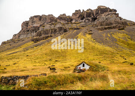Icelandic turf house has thick walls of stone, wood and sod to insulate ...