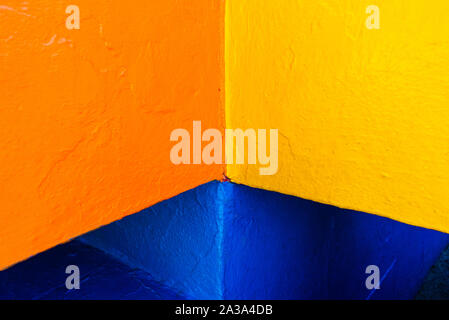 Abstract background of variable geometry and intense yellow and blue ...