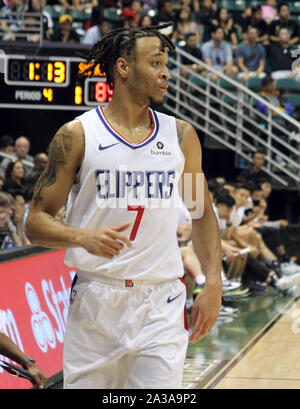 Los Angeles Clippers guard Amir Coffey, right, drives against Oklahoma ...