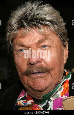Rip Taylor American comedian and actor leaving a medical centre using a ...