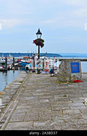 A view of Poole Harbour Haven marina with fishing goods such as nets ...