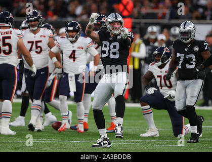 Chicago Bears defensive end Daniel Hardy (92) warms up with teammates ...