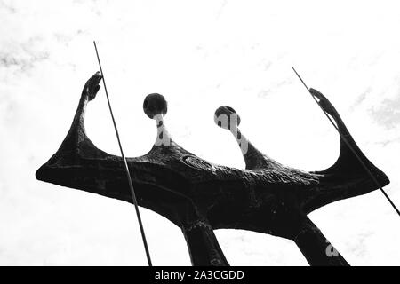 Photo of the sculpture "Os Candangos" or "Dois Guerreiros" located in ...
