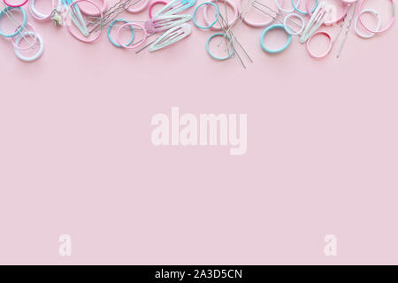 Colorful pastel accessories hairpin on pink background, close up ...