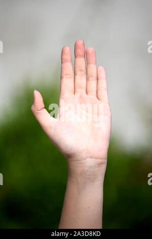 asian pretty woman make a waving arms pose Stock Photo - Alamy
