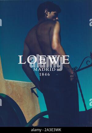 poster advertising Loewe fashion house with Taylor Russell in paper ...