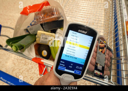 Food in supermarket shopping trolly with Scan as you shop handset Stock ...