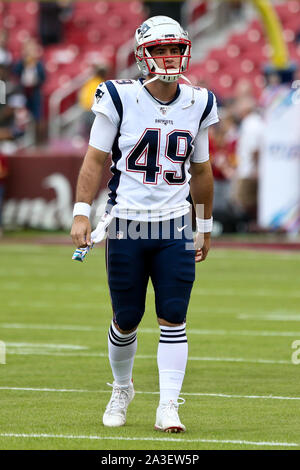 New England Patriots long snapper Joe Cardona (49) prepares to snap the ...
