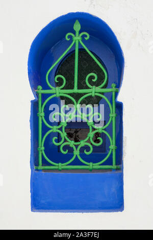 Moroccan window design with a metal railing in Asilah, Northern Morocco ...