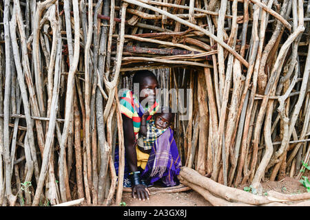 UGANDA, Karamoja, Kaabong, Karamojong tribe, Lochom village, woman with ...