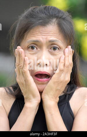 A Startled Female Senior Stock Photo - Alamy