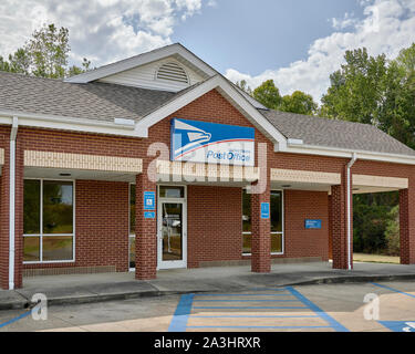 Exterior front entrance to the small rural town Post Office in Pike ...