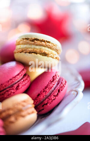 red festive Christmas background with candy in the shape of hearts ...