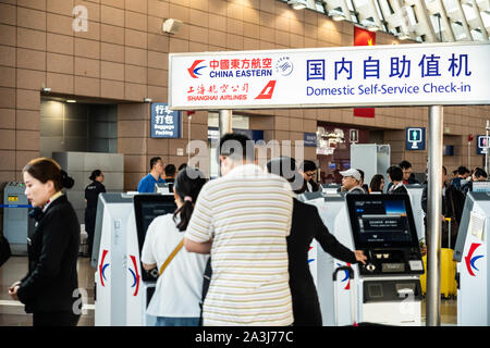 China Eastern Airlines check-in kiosk seen in Shanghai Pudong ...