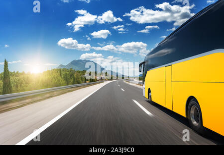 Unbranded white bus rushes along a highway Stock Photo - Alamy