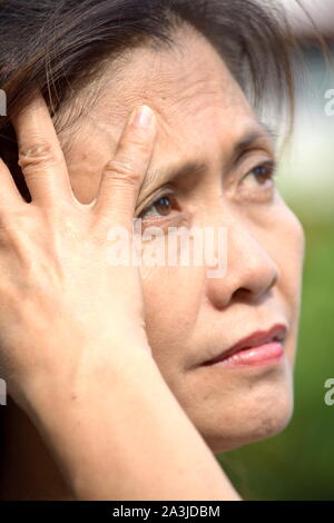 A Stressful Filipina Grandma Stock Photo - Alamy