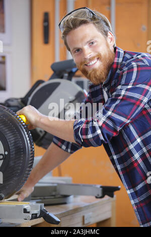 Portrait of shirtless muscular carpenter Stock Photo - Alamy